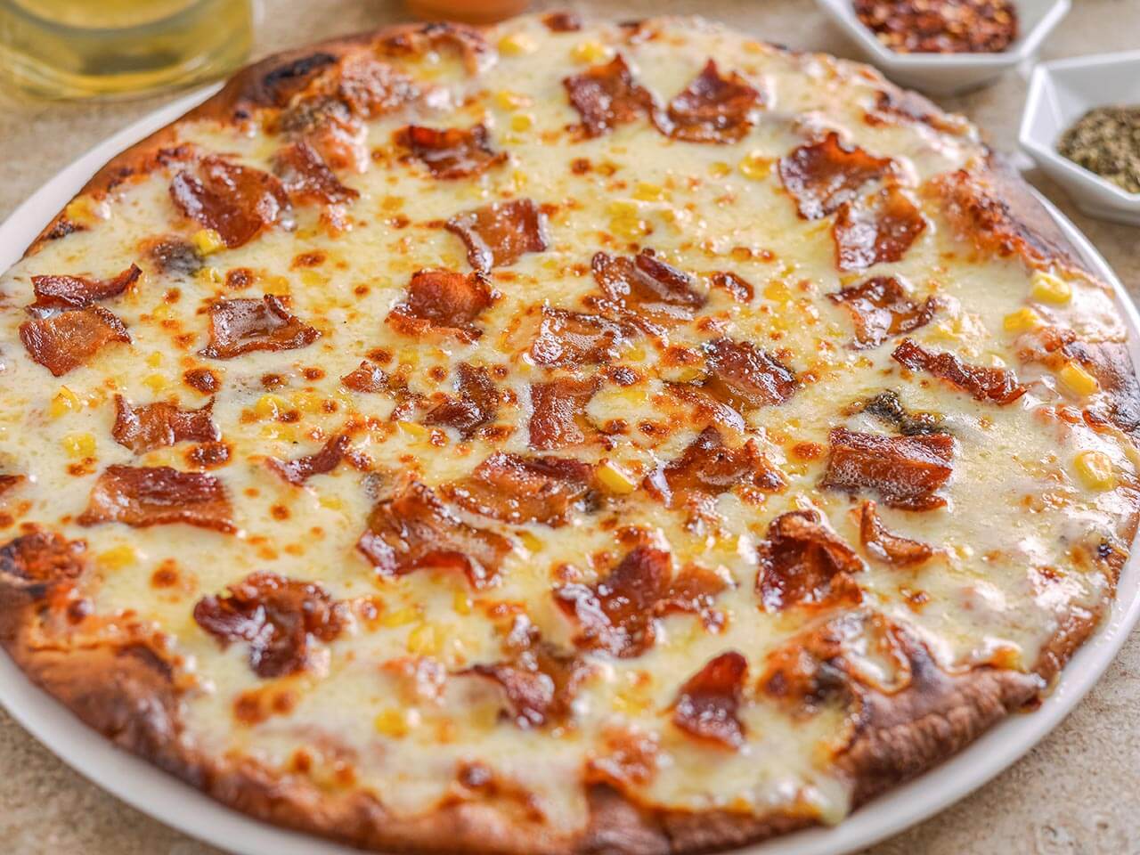 Pizza de Maíz y Tocineta – Hotel Almirante App